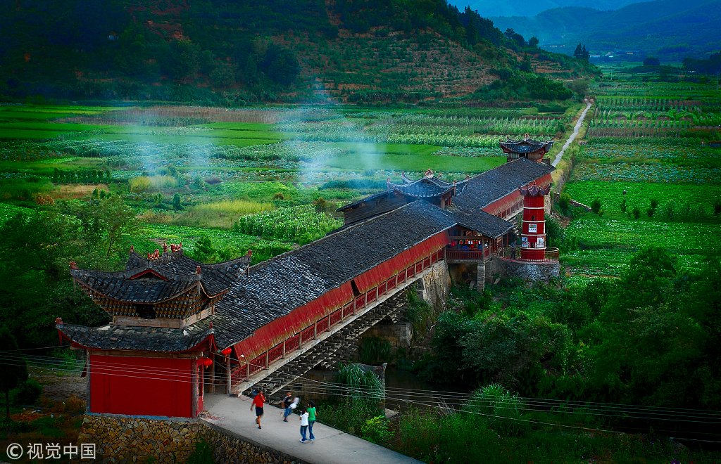 Photos: 500-year-old ancient wooden bridge in China burnt down - P.M. News